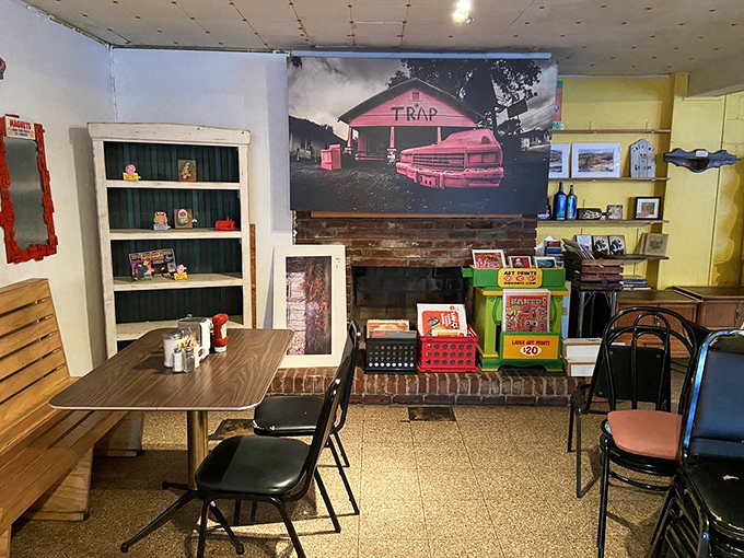 Every inch of wall space tells a story—this isn't corporate-approved décor, it's a community bulletin board disguised as restaurant art.