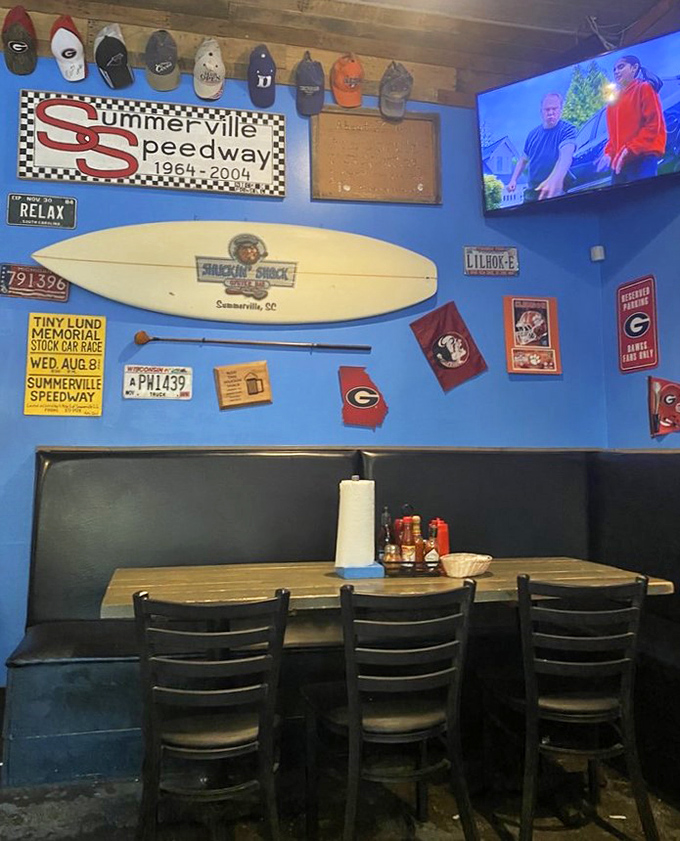 Sports memorabilia, college pennants, and a surfboard – the decor screams "local joint where memories are made" between bites of seafood.