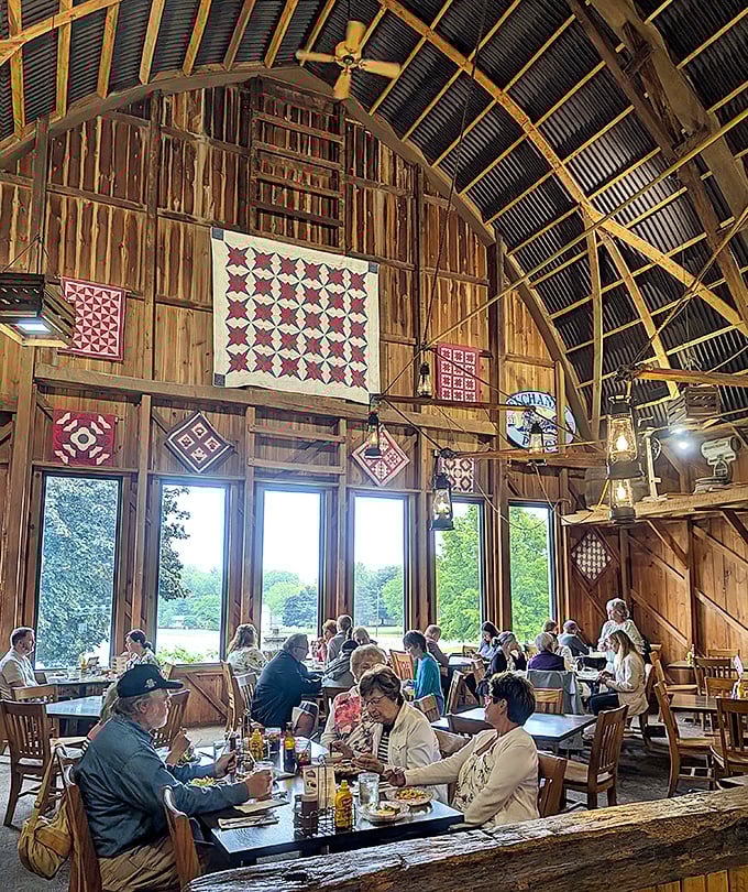 Handcrafted quilts adorn walls that have witnessed countless celebrations. The windows frame the Ohio countryside like living paintings.