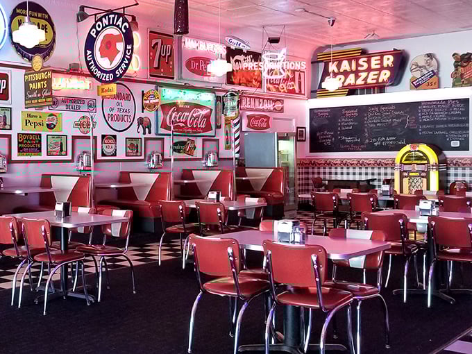 Red vinyl booths and chrome-edged tables aren't trying to be retro—they've simply never left, creating the perfect stage for comfort food performances daily.