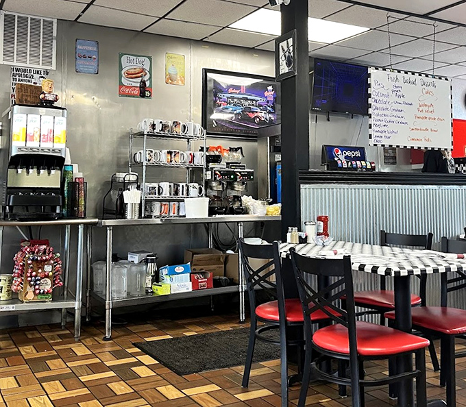 Vintage signs and coffee station—the beating heart of diner culture. Where mugs are always full and nostalgia flows freely.