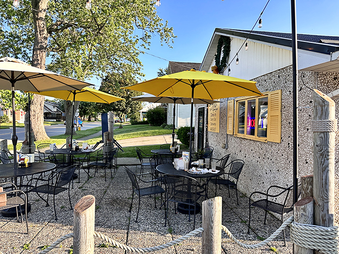 Yellow umbrellas brightening even cloudy Ohio days. The patio where summer memories are made, one pizza at a time.