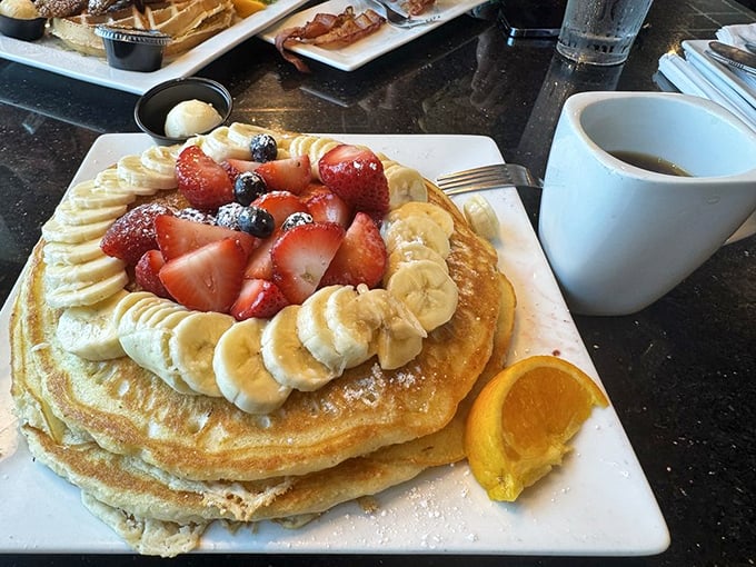 These pancakes topped with fresh fruit look like they escaped from a breakfast fairy tale.