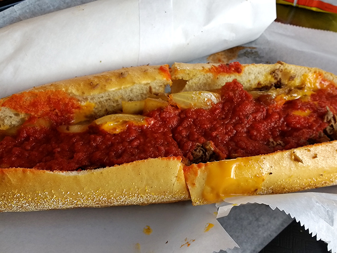 The pizza steak – where two of humanity's greatest culinary achievements merge into one glorious, sauce-laden masterpiece that demands to be devoured.