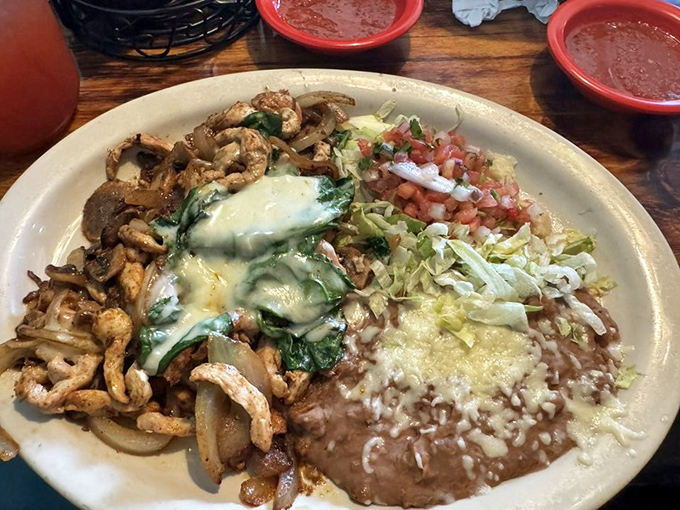 A plate that doesn't just feed you—it tells a story. Grilled chicken, melted cheese, and fresh vegetables creating a narrative worth savoring until the last bite.