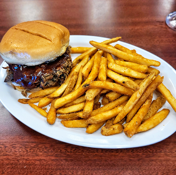 A burger and fries that doesn't need filters or fancy lighting – just honest, straightforward deliciousness that speaks the universal language of comfort. 