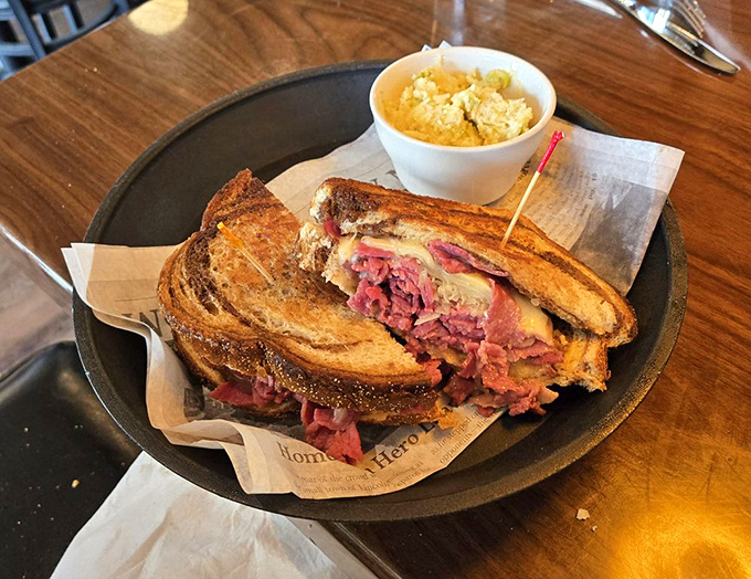 Their Reuben is a towering masterpiece of warm corned beef, sauerkraut, and melted Swiss—an architectural marvel that demands a strategic first bite.