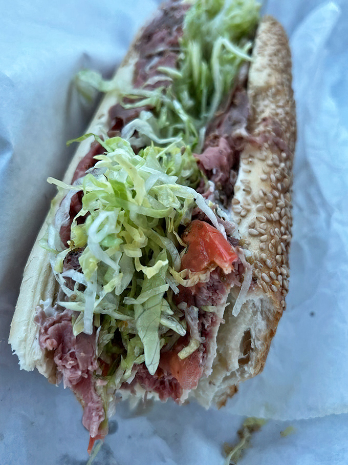 This hoagie isn't just food—it's a commitment. Layers of thinly sliced meat and fresh vegetables create a sandwich worth crossing state lines for.