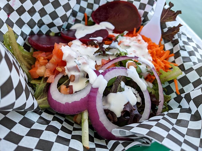 A salad that doesn't apologize for being healthy – it's too busy showing off its vibrant colors and fresh ingredients.
