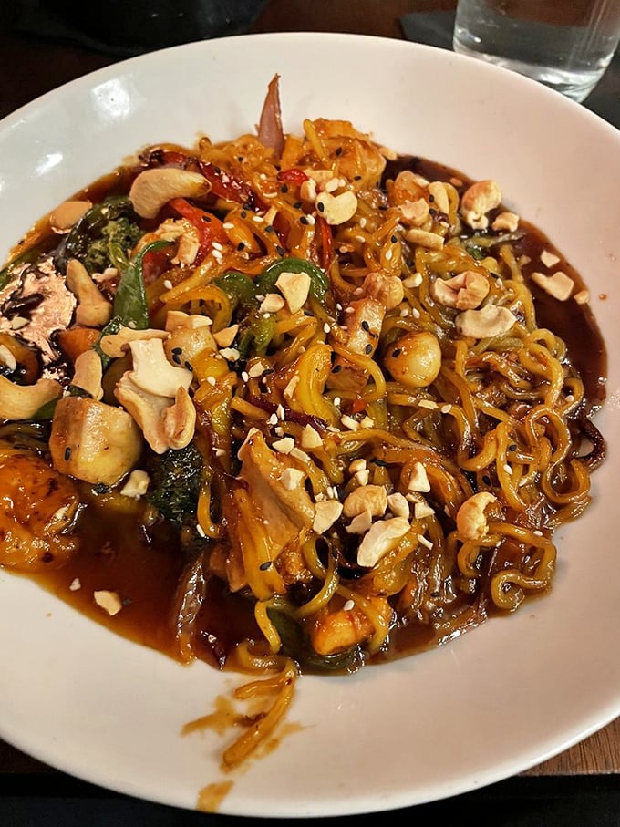This isn't just noodles—it's a seafood lo mein where East meets Midwest, with cashews adding the perfect crunch to this umami symphony.