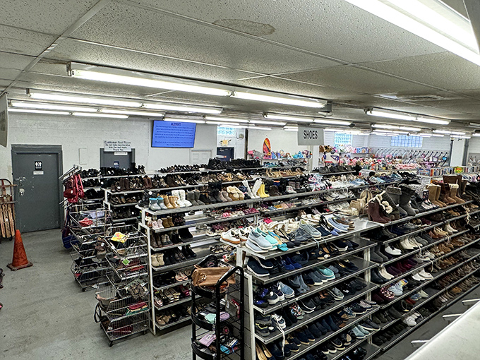 The shoe department: a footwear historian's dream where barely-worn loafers sit beside well-loved hiking boots, each with stories to tell.