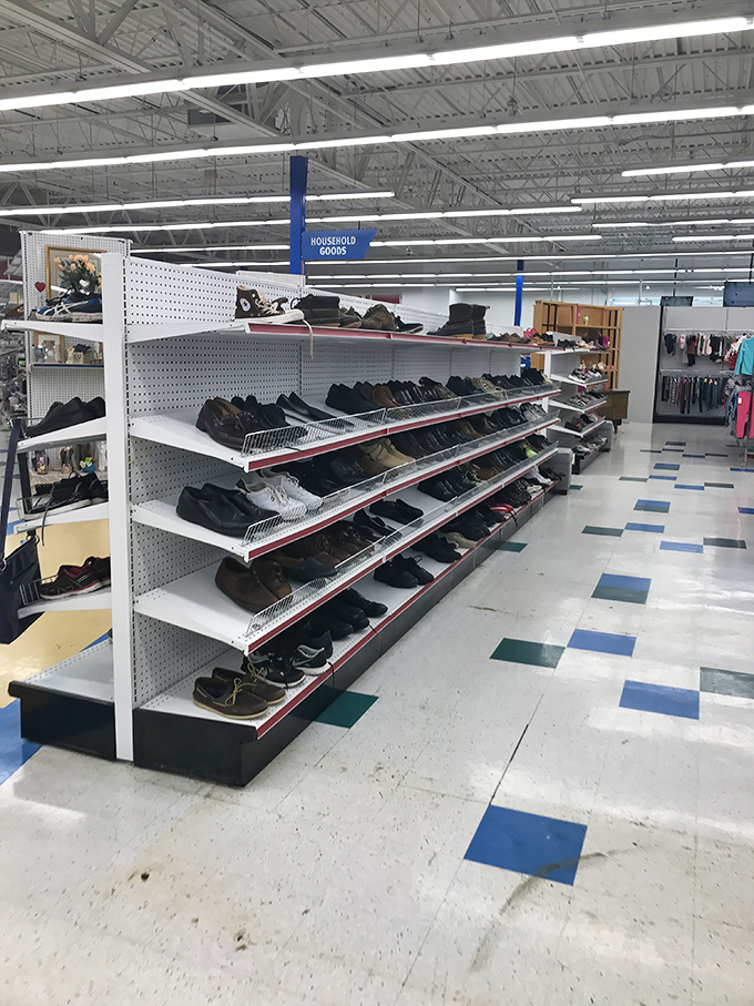 Shoe shelves hold sole stories from countless adventures, ready for their next walking chapter.