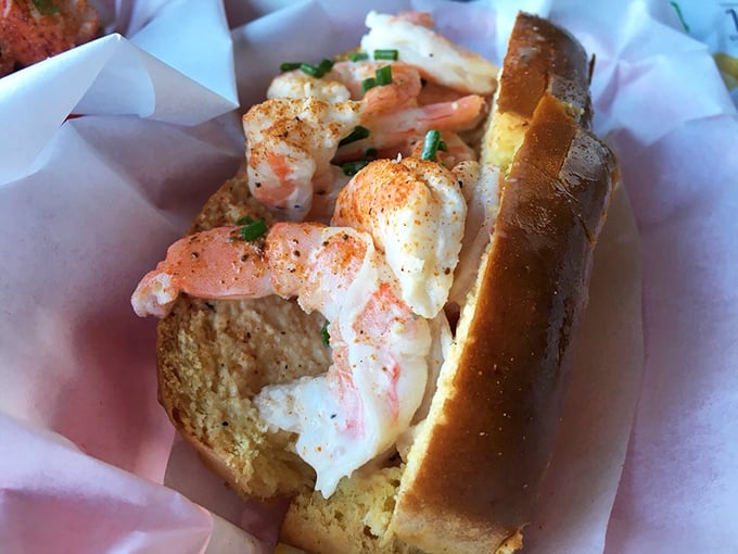 The shrimp roll—lobster's equally delicious but slightly more affordable cousin—proves that sometimes the understudy deserves a standing ovation too.
