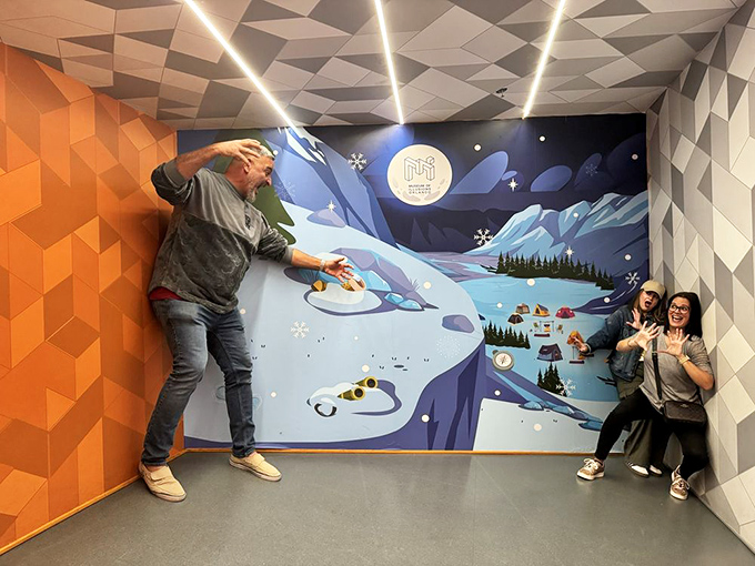 That winter scene isn't just cool – it's an interactive backdrop where forced perspective turns visitors into accidental giants or tiny explorers.