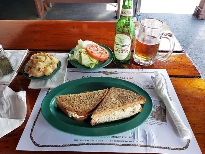 A sandwich that proves bread's highest calling is to deliver smoked fish spread to your mouth, accompanied by a cold beer.