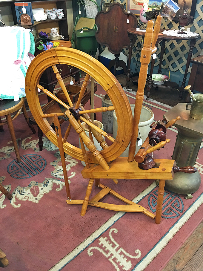This isn't just a spinning wheel—it's a functional piece of American craftsmanship that transformed raw wool into warm garments for generations.