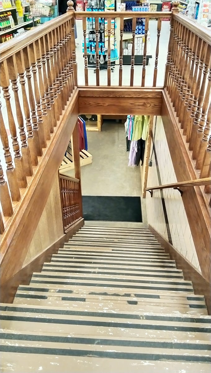 These wooden stairs have carried generations of shoppers to treasures below. Architectural poetry in well-worn steps.