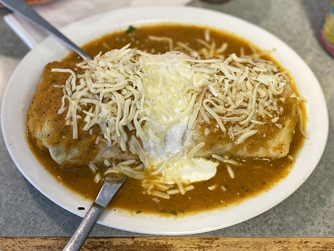 When your burrito needs a sauce bath, this wet version delivers comfort food at its most glorious. 