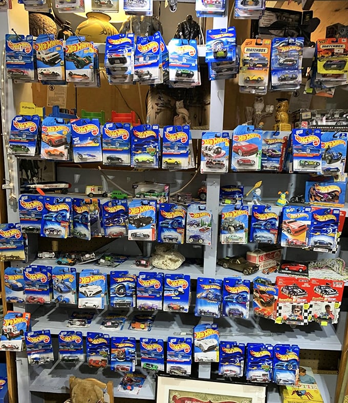 Hot Wheels heaven! For collectors, this wall represents childhood dreams meticulously preserved in their original packaging—tiny time capsules on wheels.