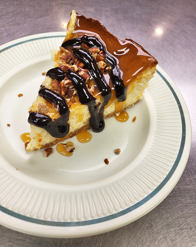 Turtle cheesecake that makes sharing impossible. That drizzle of chocolate and caramel should be classified as a controlled substance.