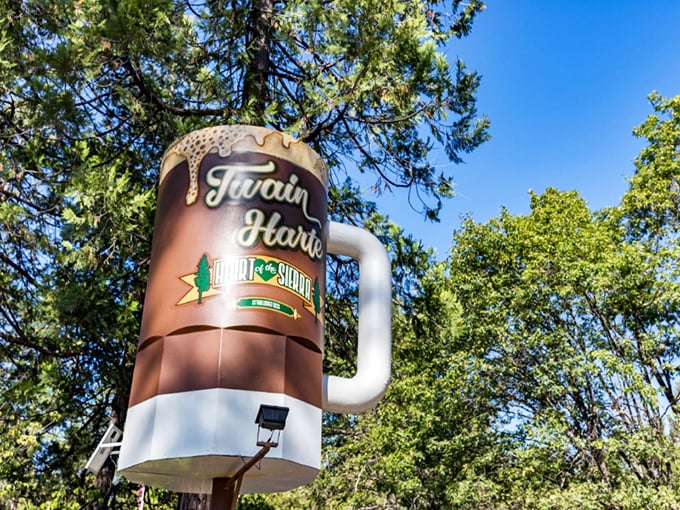 The giant beer mug landmark – because nothing says "mountain vacation" quite like oversized beverage sculptures among the pines.