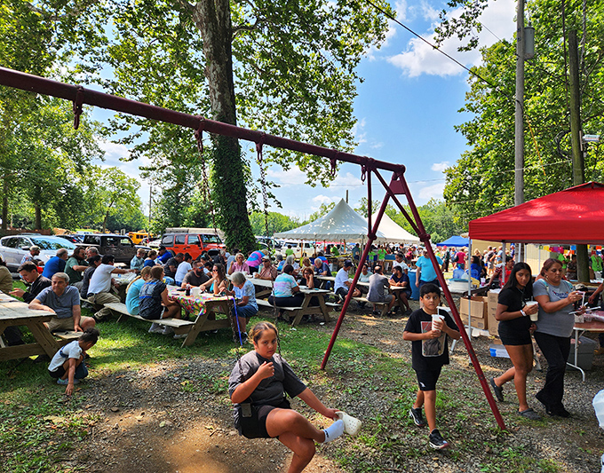 The universal flea market fuel station—where hungry treasure hunters recharge under leafy canopies before diving back into the hunt.