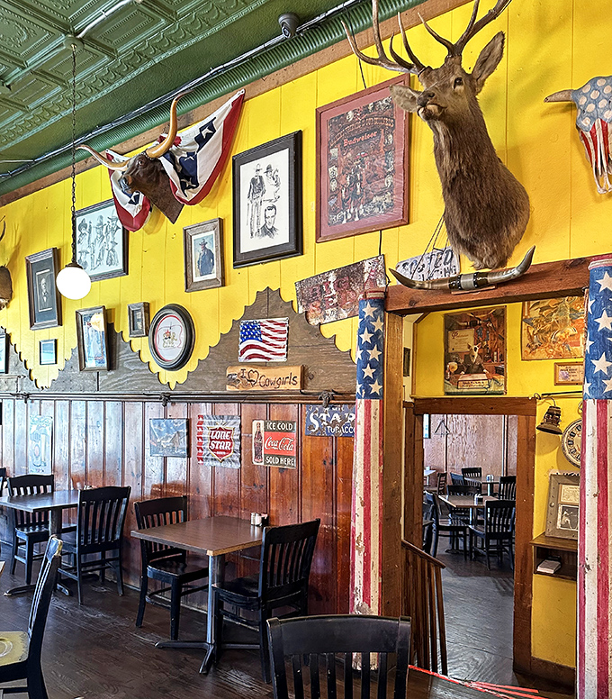 The walls tell stories of Texas pride – mounted trophies, framed memories, and Americana that feels earned rather than manufactured.