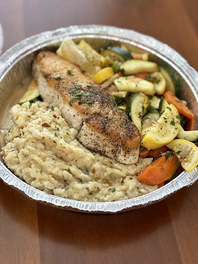 This perfectly seared fish atop risotto isn't just dinner; it's what other dinners aspire to be when they grow up.
