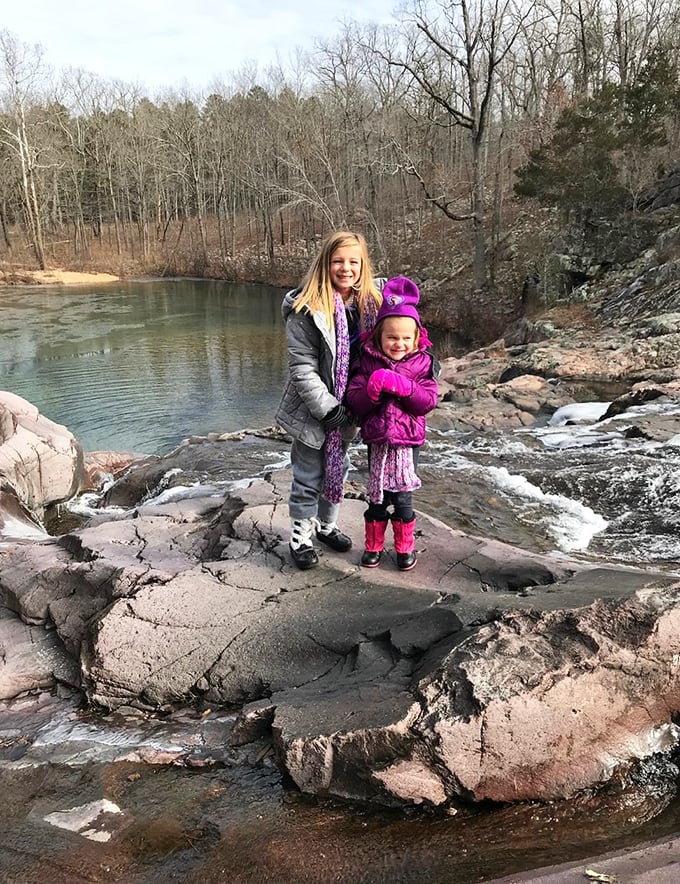 Winter reveals a different side of Rocky Falls—quiet waters, sleeping forests, and bundled-up smiles exploring nature's chill.