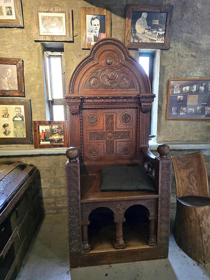 Not just any chair—a proper throne fit for royalty or tired tourists needing a medieval moment of rest after climbing those authentic stone stairs.