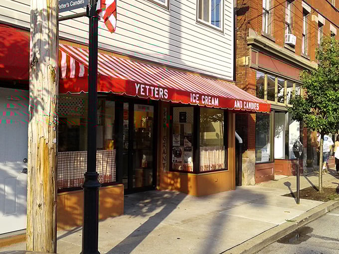 Yetter's Ice Cream and Candies serves up sweet nostalgia under classic red-and-white awnings, where every scoop comes with a side of small-town charm.