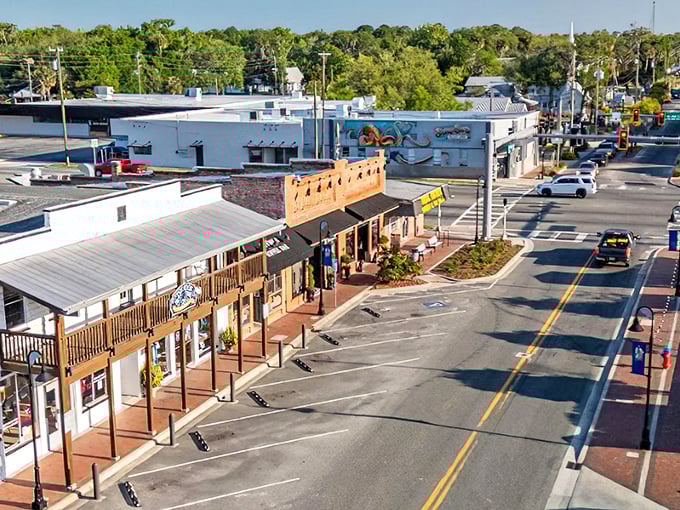 Main Street, Crystal River style—where covered walkways invite leisurely shopping and spontaneous conversations with shopkeepers who remember your name.