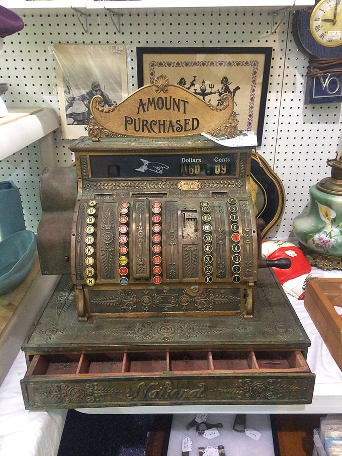 This antique National cash register wasn't just for transactions; it was mechanical theater for shoppers of yesteryear.