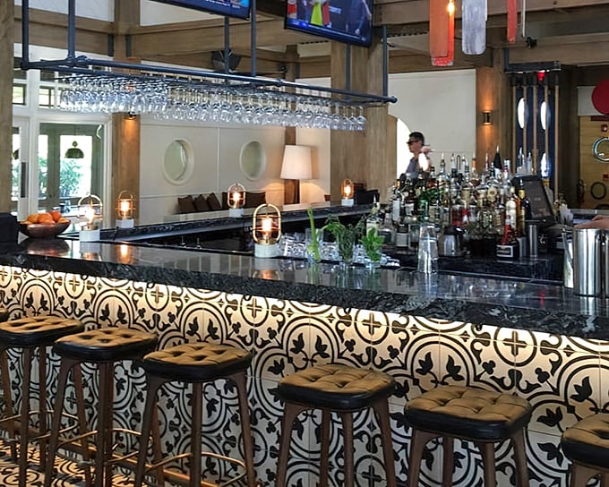 This isn't just a bar—it's command central for liquid happiness. Those patterned tiles tell stories of cocktails past and future.