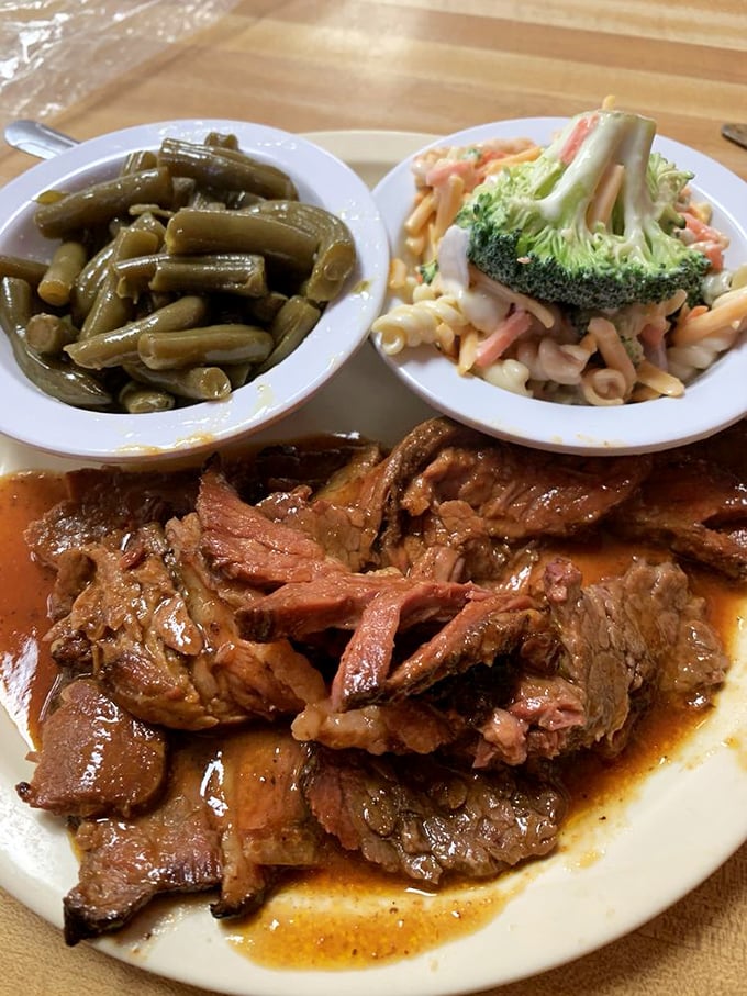 This isn't just pot roast; it's a time machine to Sunday dinners at grandma's, complete with vegetables that have soaked up all that savory goodness.