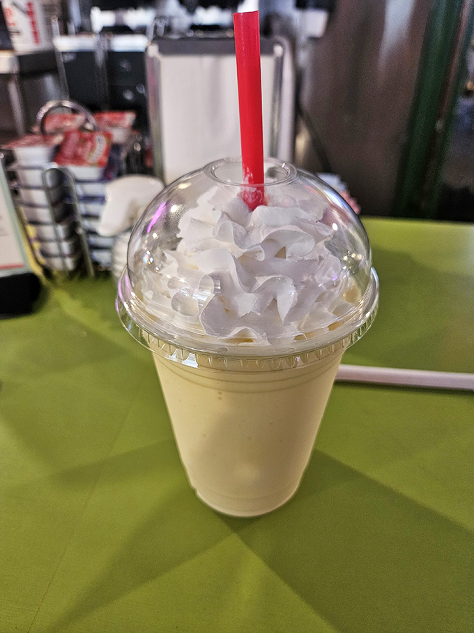 This isn't just a milkshake—it's a hand-spun time machine topped with whipped cream that transports you back to simpler days when calories didn't exist.