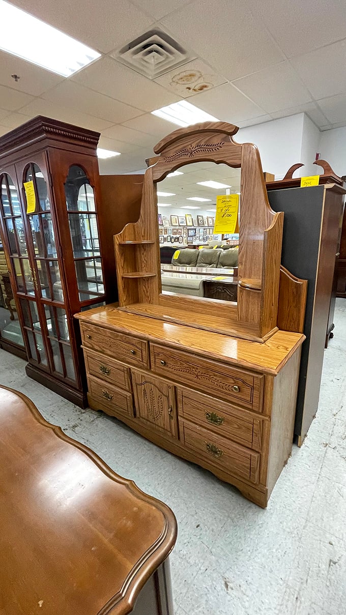 This oak dresser with mirror has witnessed more morning routines than a barista at the busiest Starbucks in Manhattan.