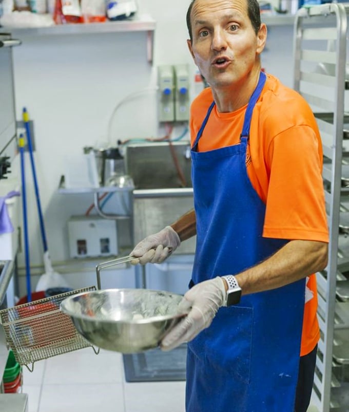 Behind every great seafood dish is someone who knows exactly what they're doing. That look says, "Trust me, I've got this."