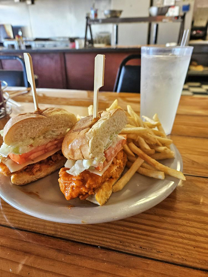 A chicken sandwich that makes fast food versions hide in shame, paired with fries so perfectly golden they deserve their own trophy.