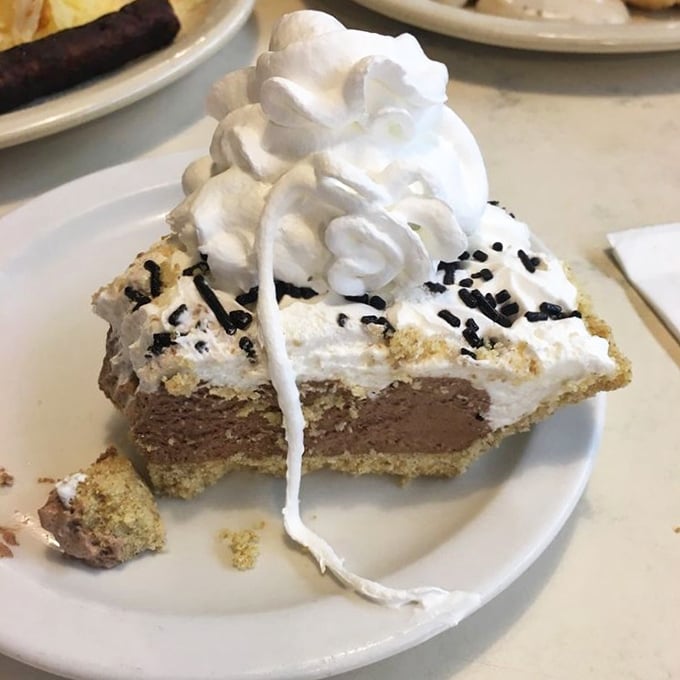 This isn't just pie—it's therapy with whipped cream on top, the kind that makes you forget whatever problem sent you seeking comfort in the first place.