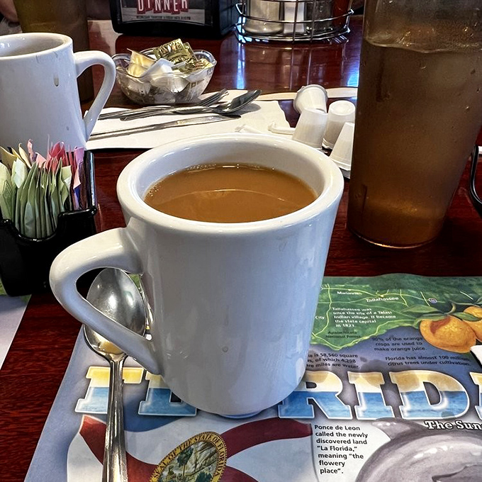 That perfect diner coffee moment—strong enough to jumpstart your heart but served with enough Florida sunshine to make mornings bearable.