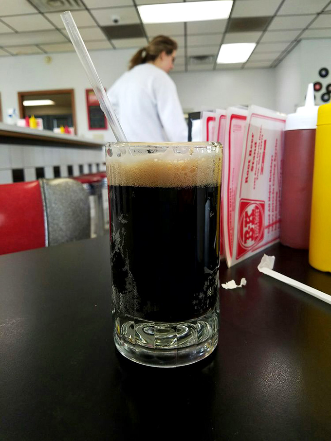 That perfect mug of homemade root beer – dark as midnight, frothy on top, and ready to transport you back to simpler times with just one sip.