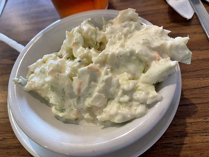 Creamy coleslaw that knows its supporting role—the perfect sidekick to cut through richer dishes without stealing the spotlight.