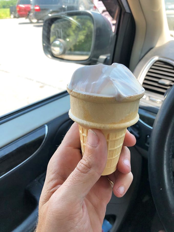 Ice cream in a cone, enjoyed in your car—the quintessential summer ritual that makes Pennsylvania heat waves bearable.