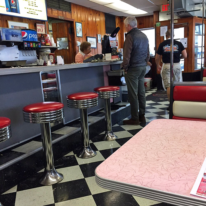The counter-and-stool arrangement—a uniquely American invention that's better than therapy. Problems seem smaller when discussed over coffee.