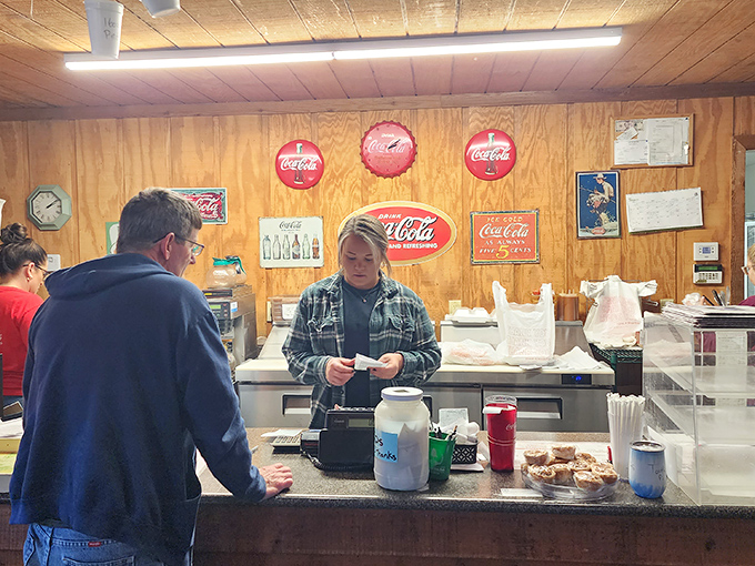 Coca-Cola memorabilia adorns the walls—because in Georgia, the only thing that pairs better with barbecue than sweet tea is an ice-cold Coke.