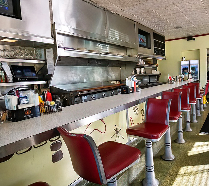 Counter seating that invites solo diners to enjoy the show—like front-row tickets to the delicious ballet of short-order cooking that unfolds before your eyes. 