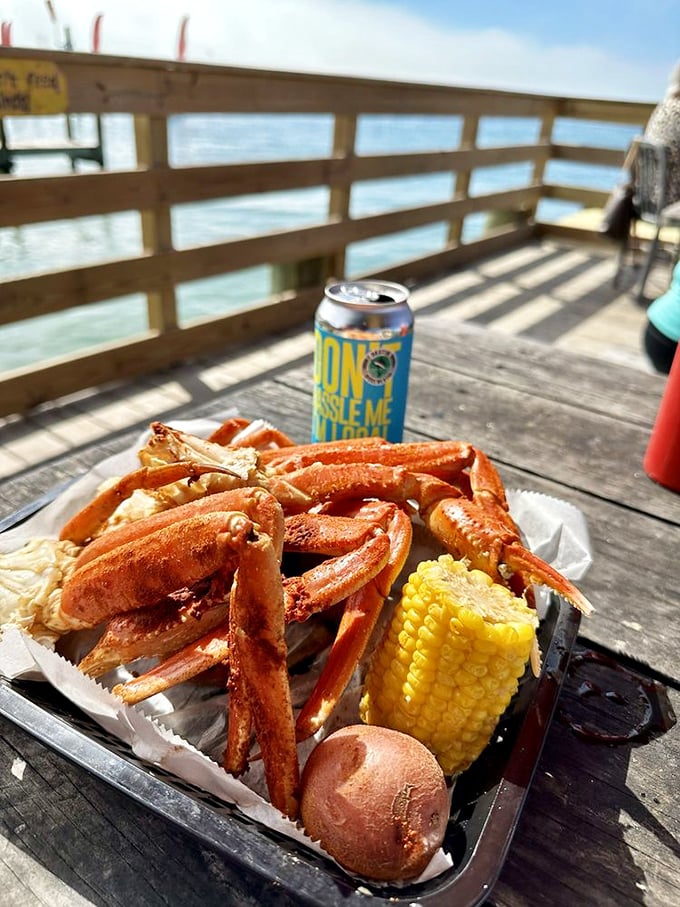 Snow crab legs basking in the sunshine – nature's perfect design for delivering sweet meat alongside corn and potatoes on a weathered dock.