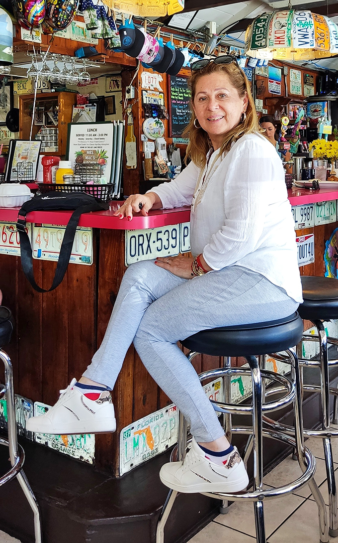 The bar area showcases the heart of Mrs. Mac's—where locals and tourists become friends over stories and key lime cocktails.