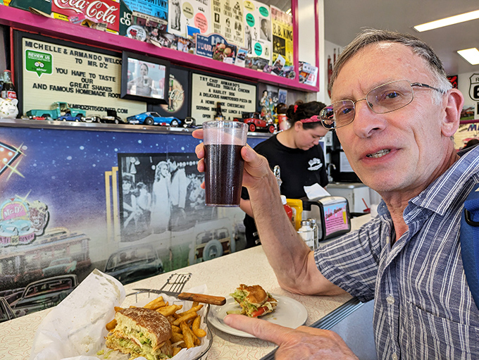 The diner experience isn't complete without good company and a sandwich that requires both hands and several napkins.